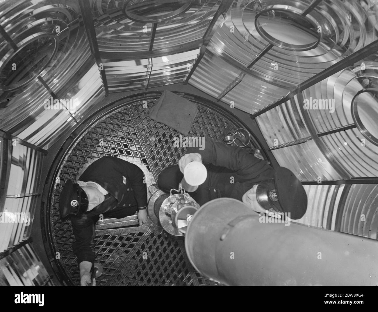 The lighthouse keepers in the light chamber interior of Dungeness ...