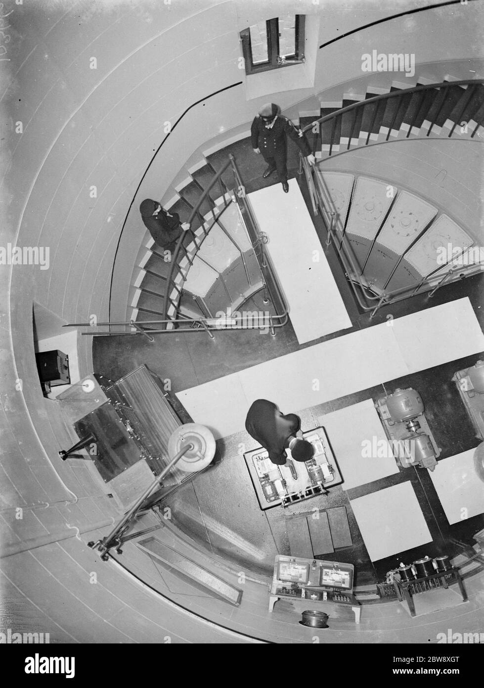 The engine room of the Dungeness lighthouse in Kent , viewed from above ...