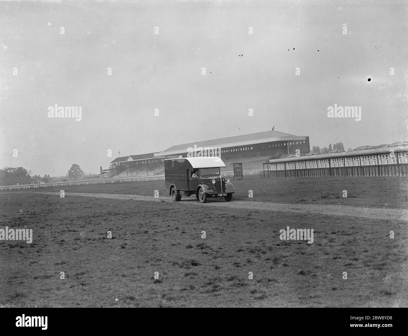 Men using a Bedford truck to set up the totalisators at Hurst Park ...