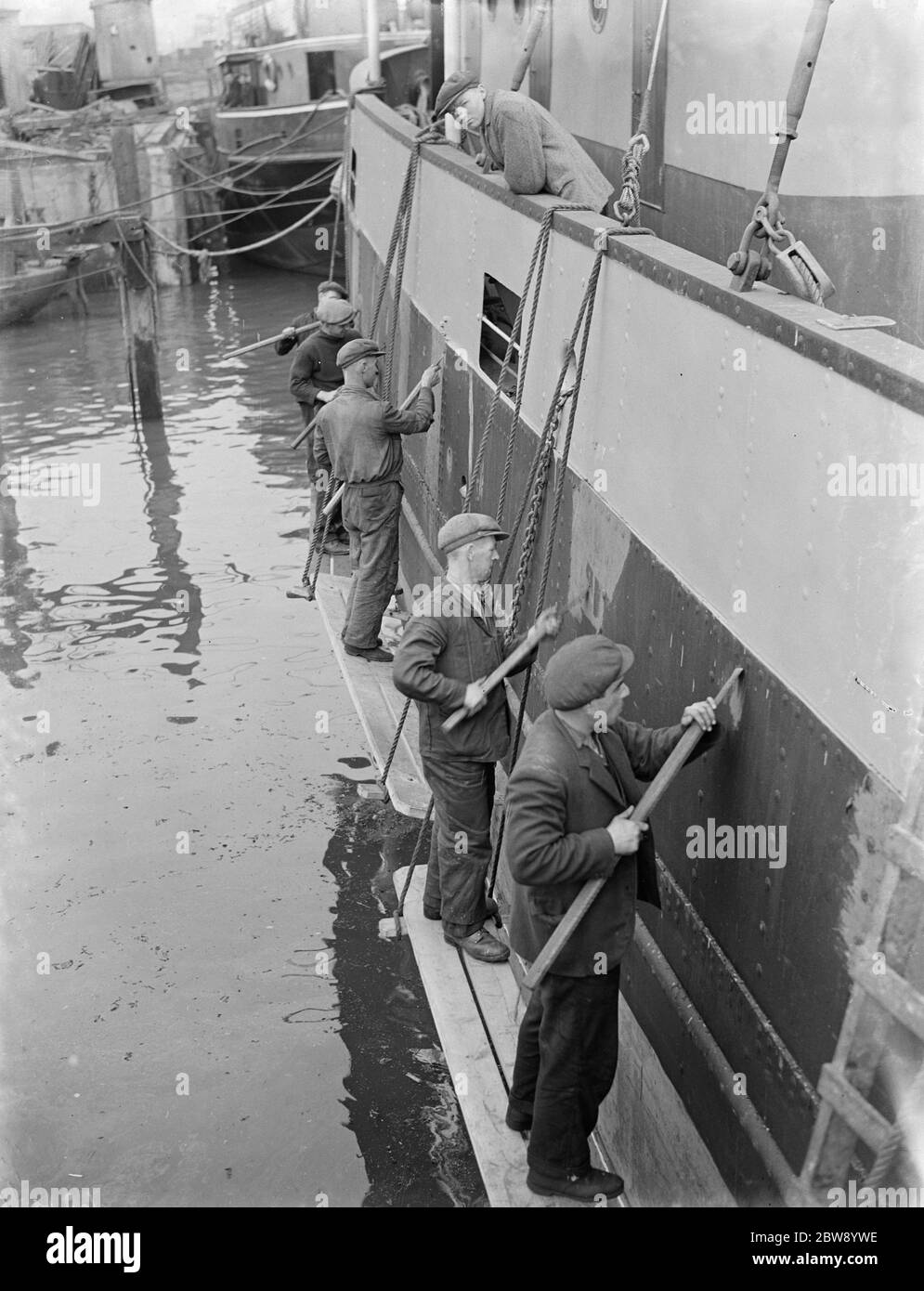 Work being done on the motor vessel ' Suavity ' which is moored at ...