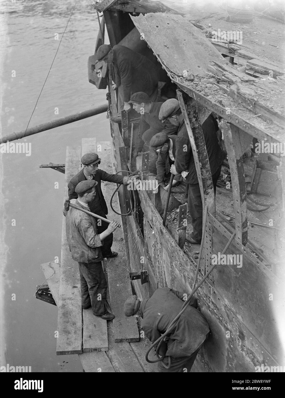 Work being done on the motor vessel ' Suavity ' which is moored at ...