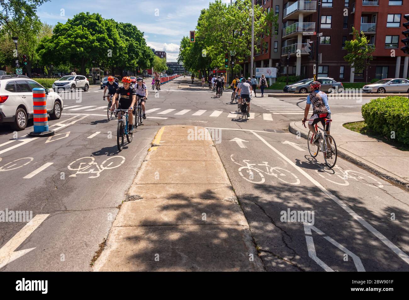 Montreal, CA - 30 May 2020: Cycling corridor on Rachel Street in the ...