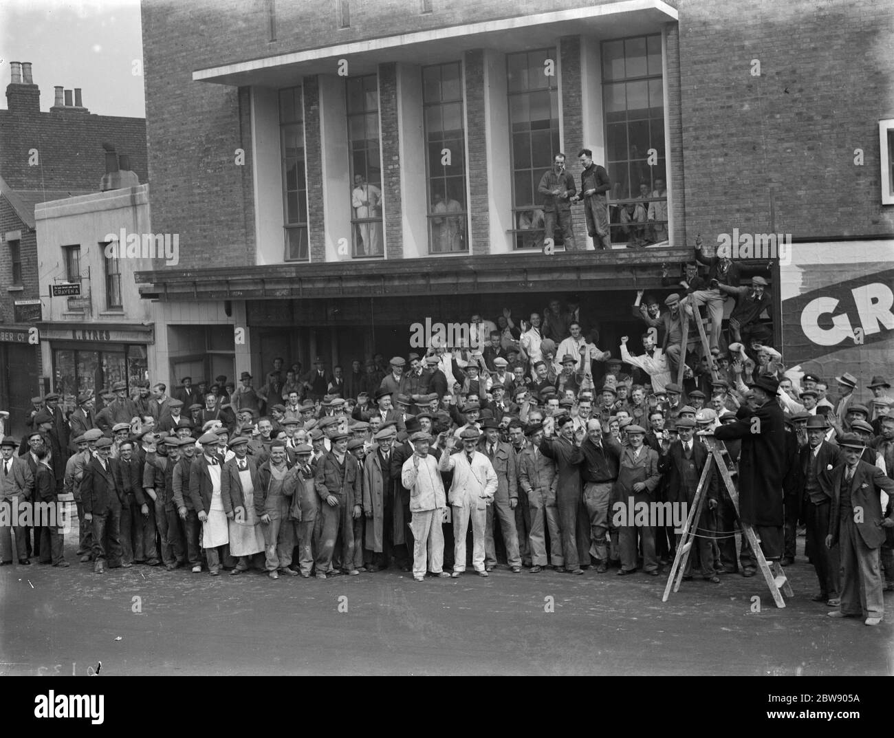 Crowd of Granada plc workmen in Woolwich , London . 1937 Stock Photo ...
