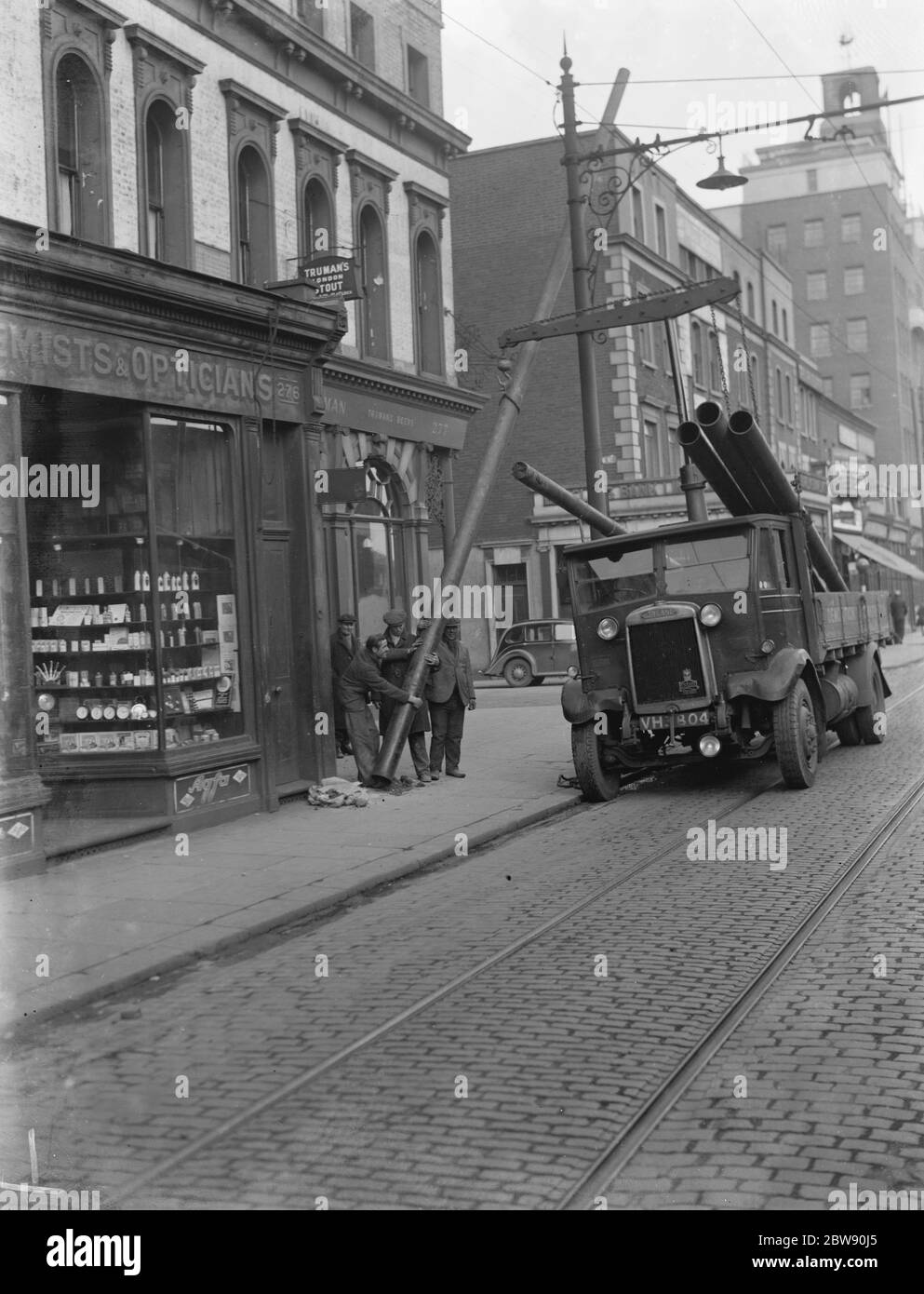 Pole planting by the Demolition and Construction Company . 1937 Stock ...