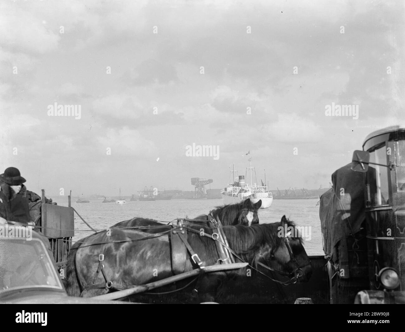 A ferry at Woolwich , London , carrying traffic . 1937 Stock Photo - Alamy