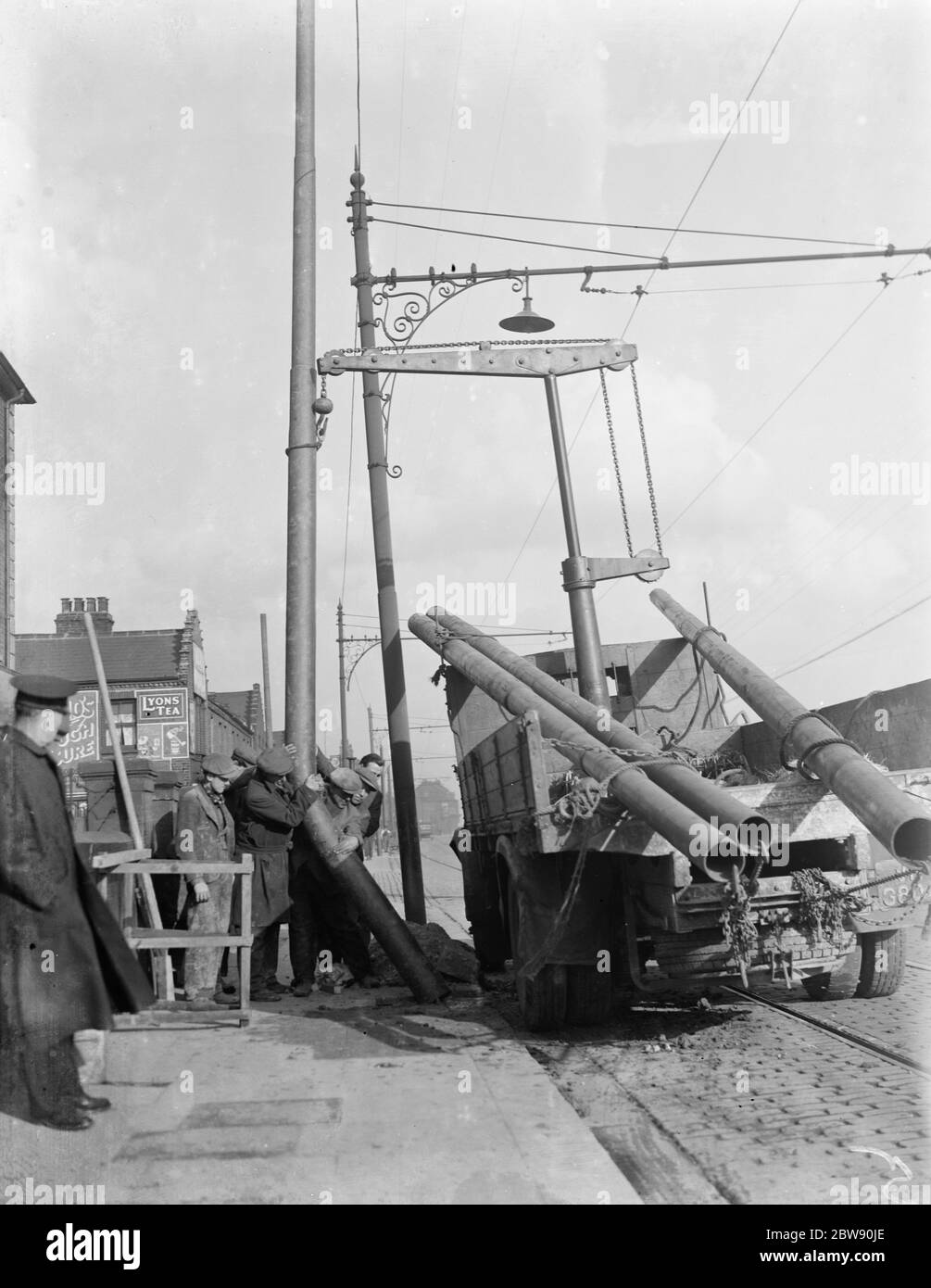 Pole planting by the Demolition and Construction Company . 1937 Stock ...