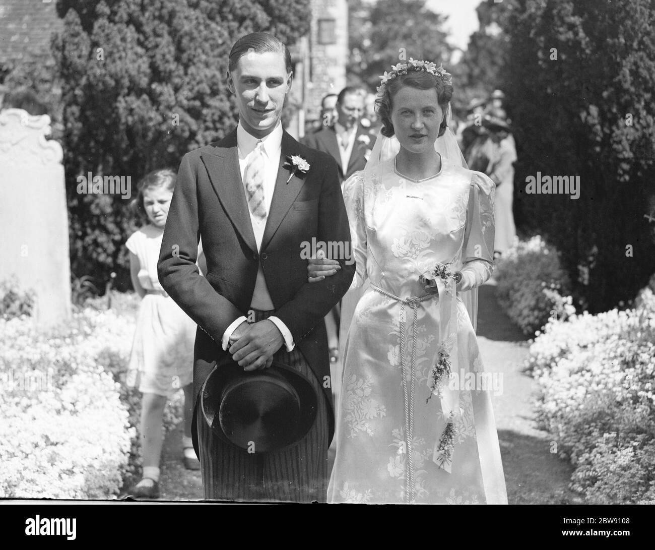 The wedding of Guy Farrr and Mary Stacey in Crayford , Kent . The bride ...