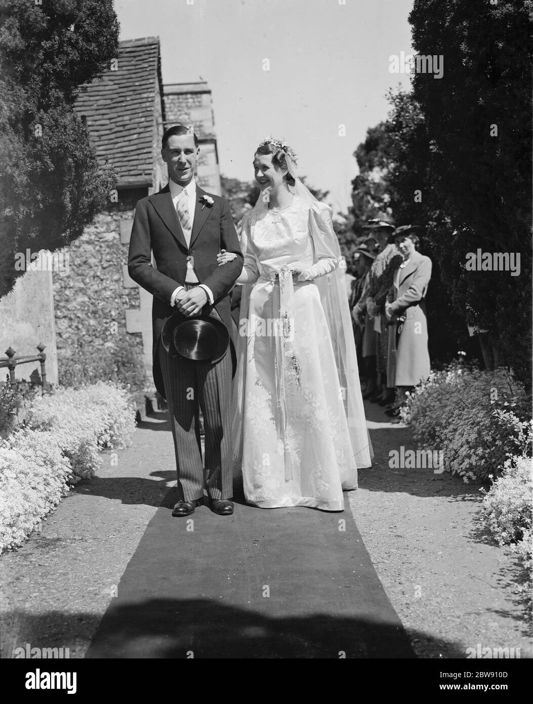 The wedding of Guy Farrr and Mary Stacey in Crayford , Kent . The bride ...