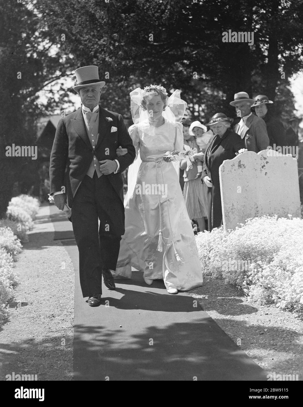 The wedding of Guy Farrr and Mary Stacey in Crayford , Kent . The bride ...
