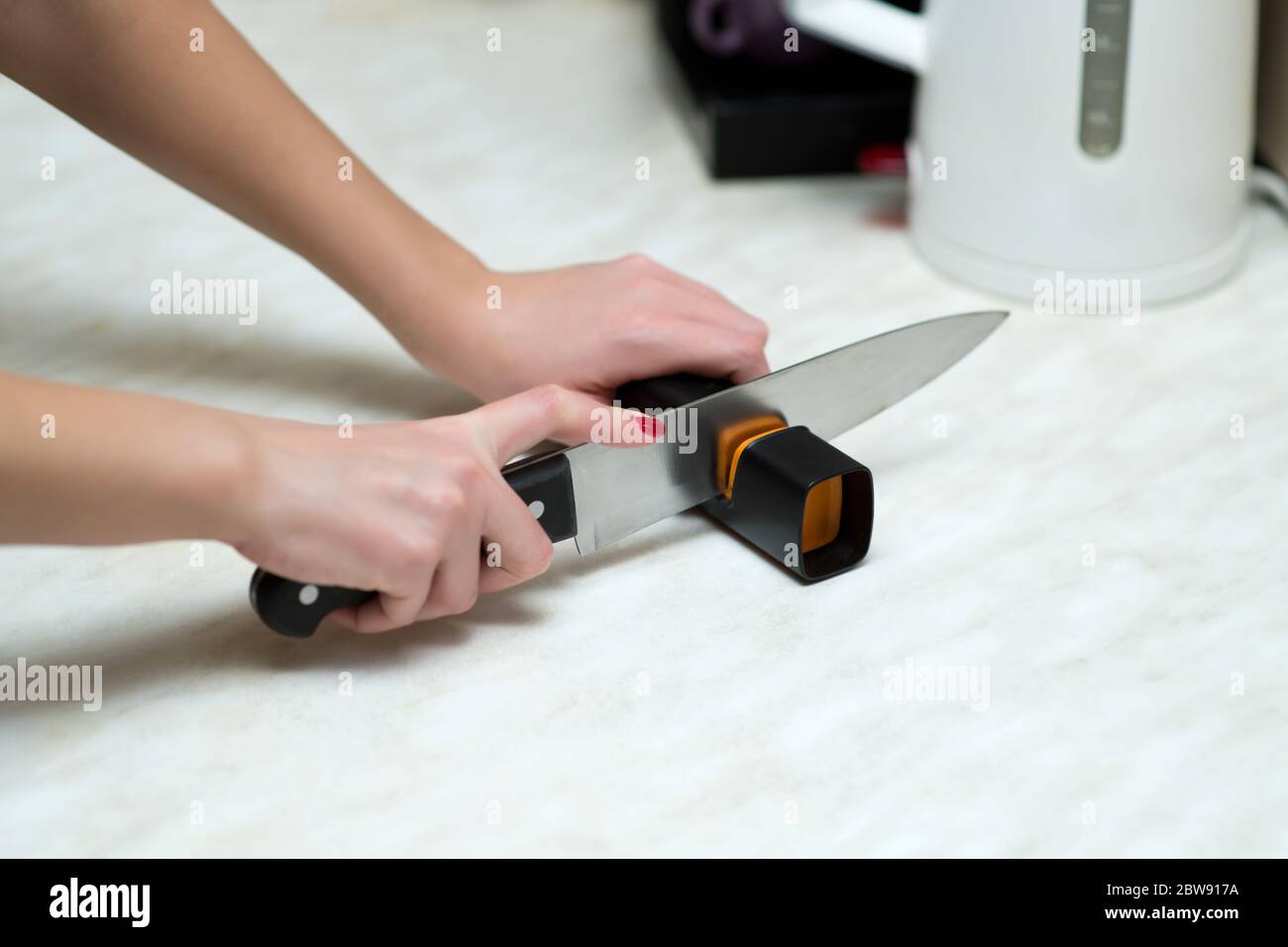 Woman sharpen hi-res stock photography and images - Alamy