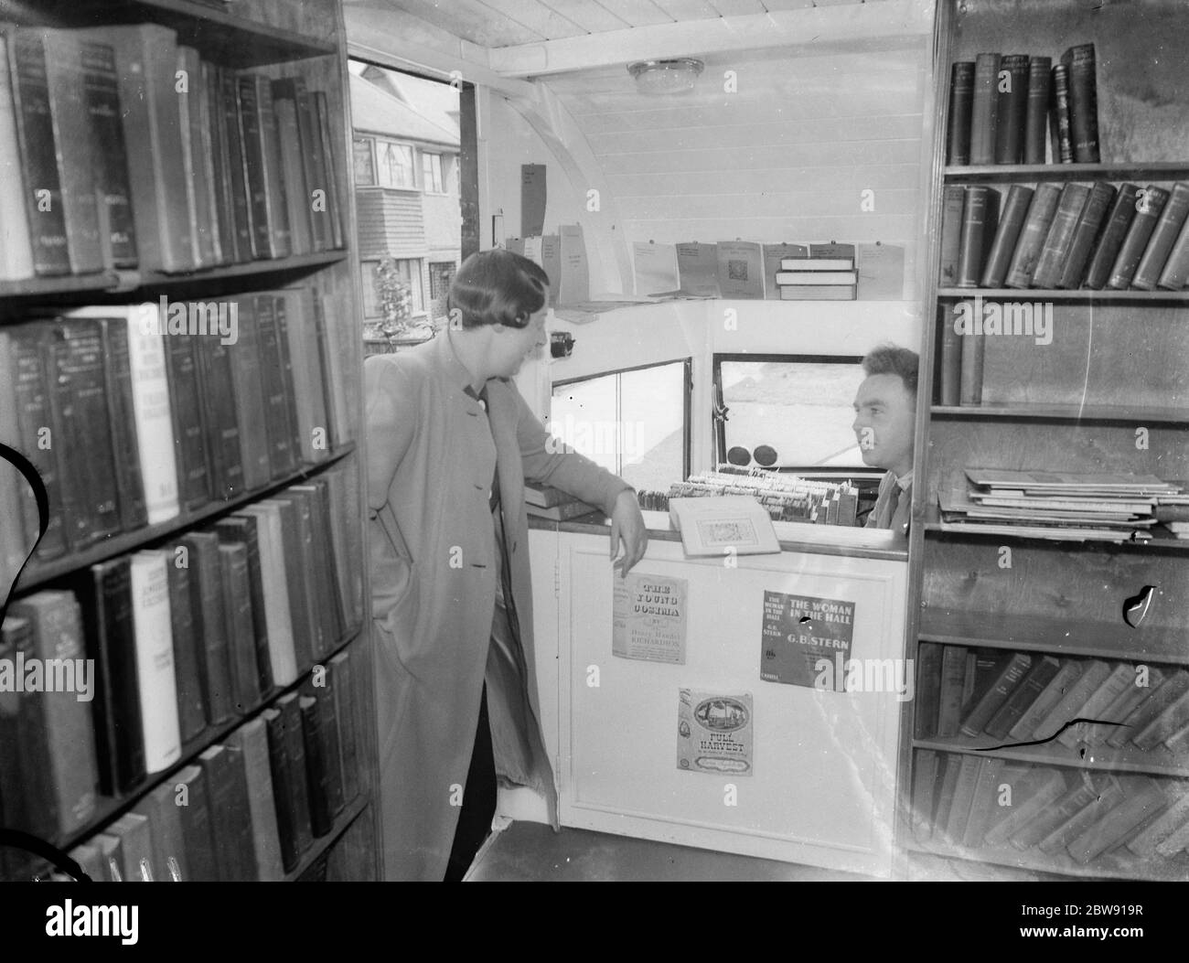 A woman visiting the Kent County mobile library . 1939 Stock Photo - Alamy