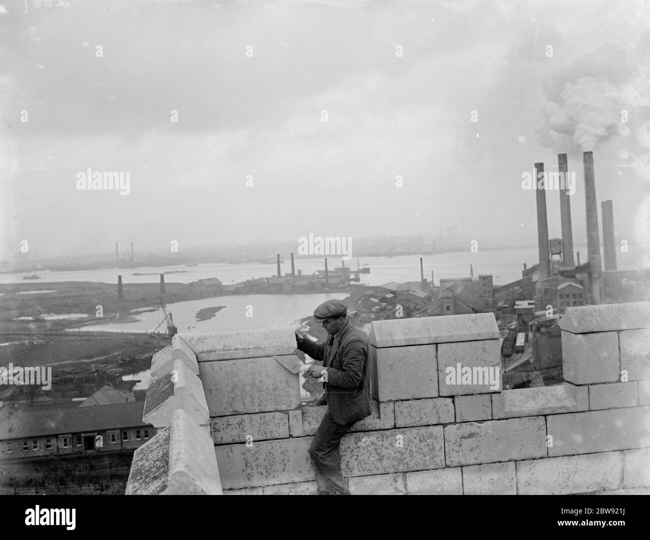 Men working at height Black and White Stock Photos & Images - Alamy