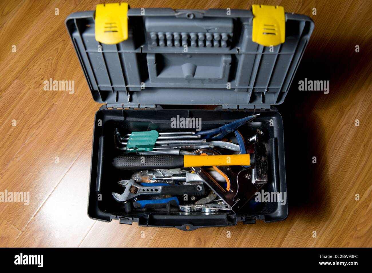 open toolbox stands on the floor Stock Photo - Alamy