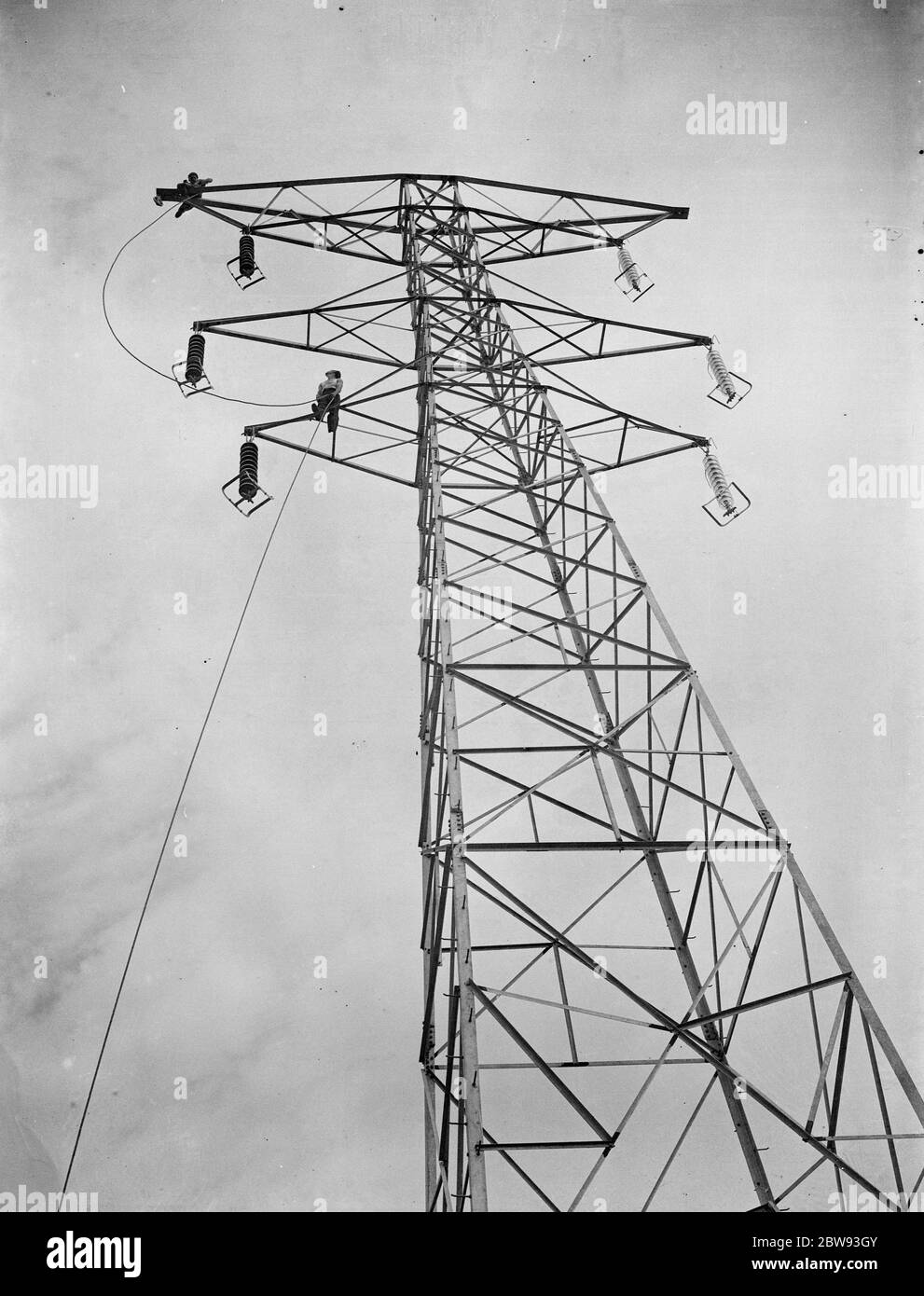 Erecting electricity pylon wires on a grid in Gravesend , Kent . 1939 ...
