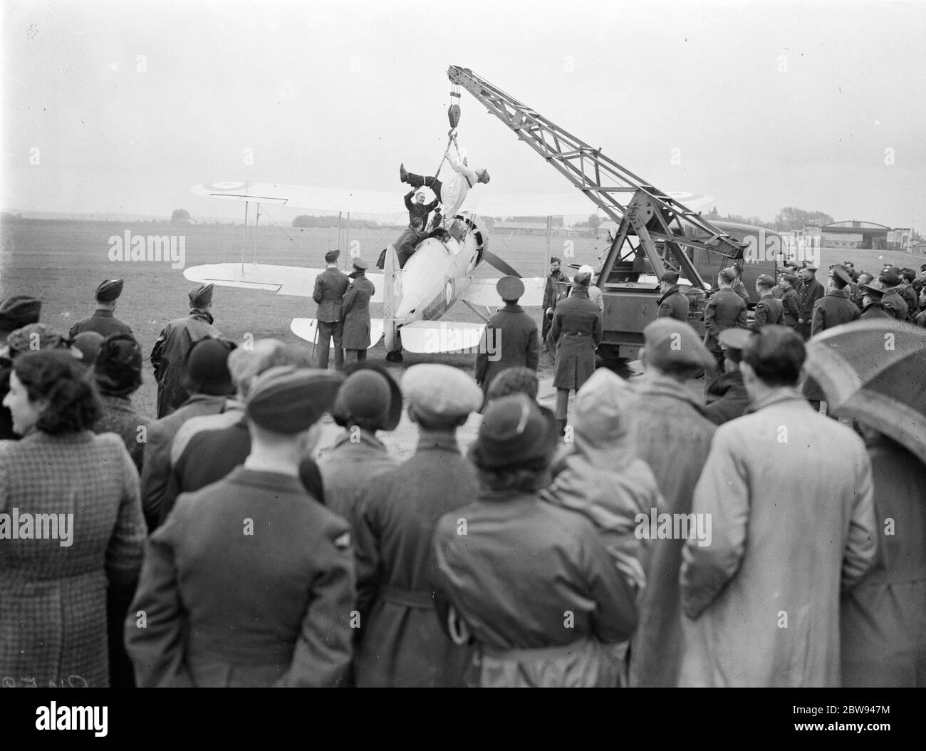 RAF display at Biggin Hill , London . Farmer Giles being hoisted up by ...