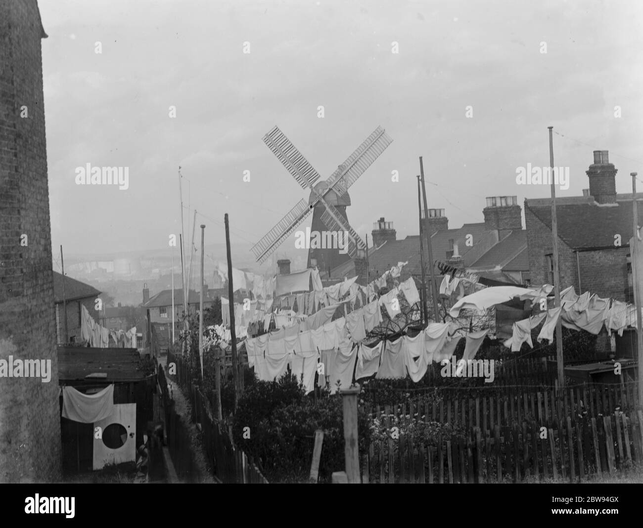 Rochester windmill in Kent , seen from behind the washing lines . 1936 ...