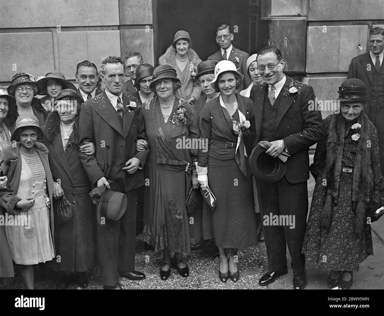 Mother and son in double wedding at London Register Office . Mother and ...