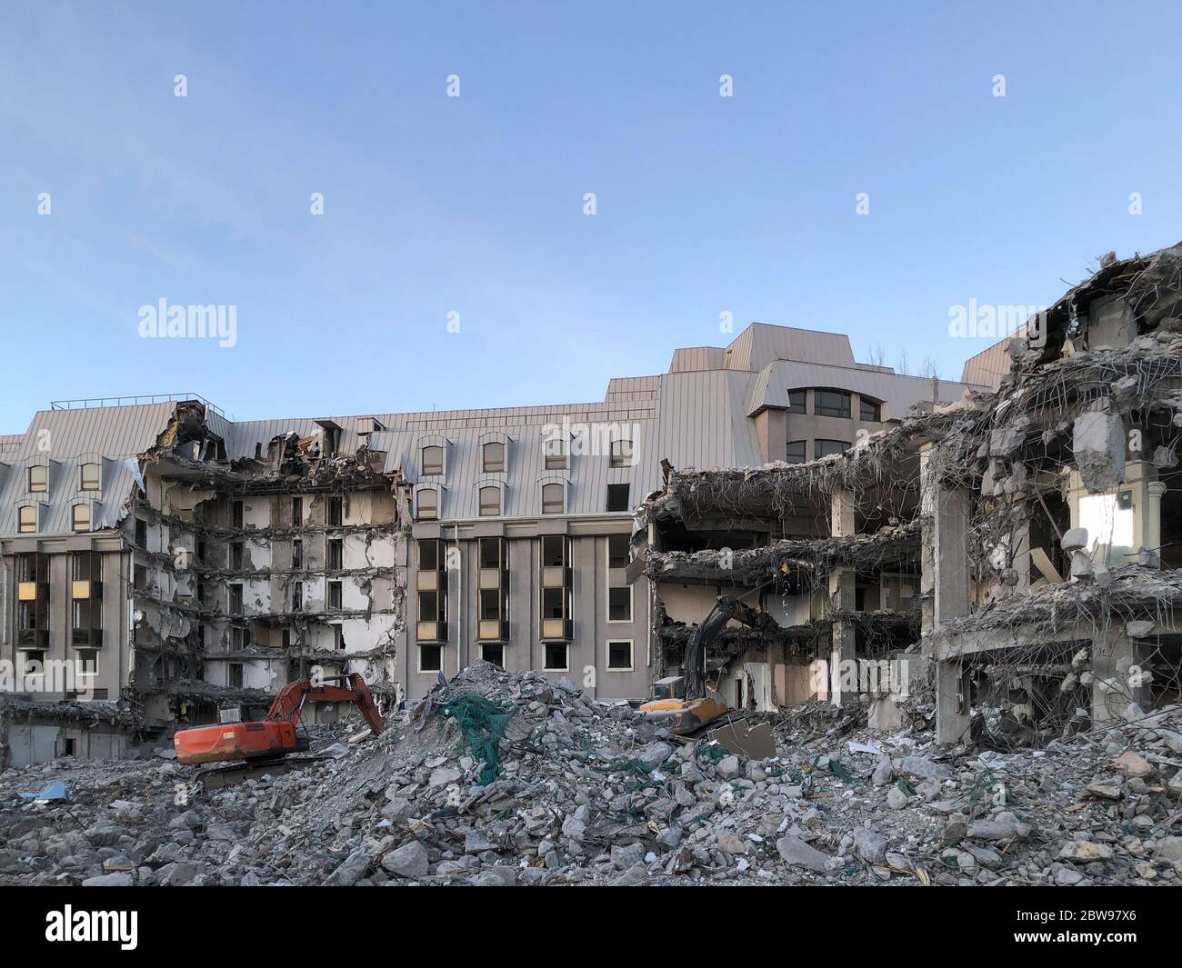 Building of the former hotel demolition for new construction, using a ...