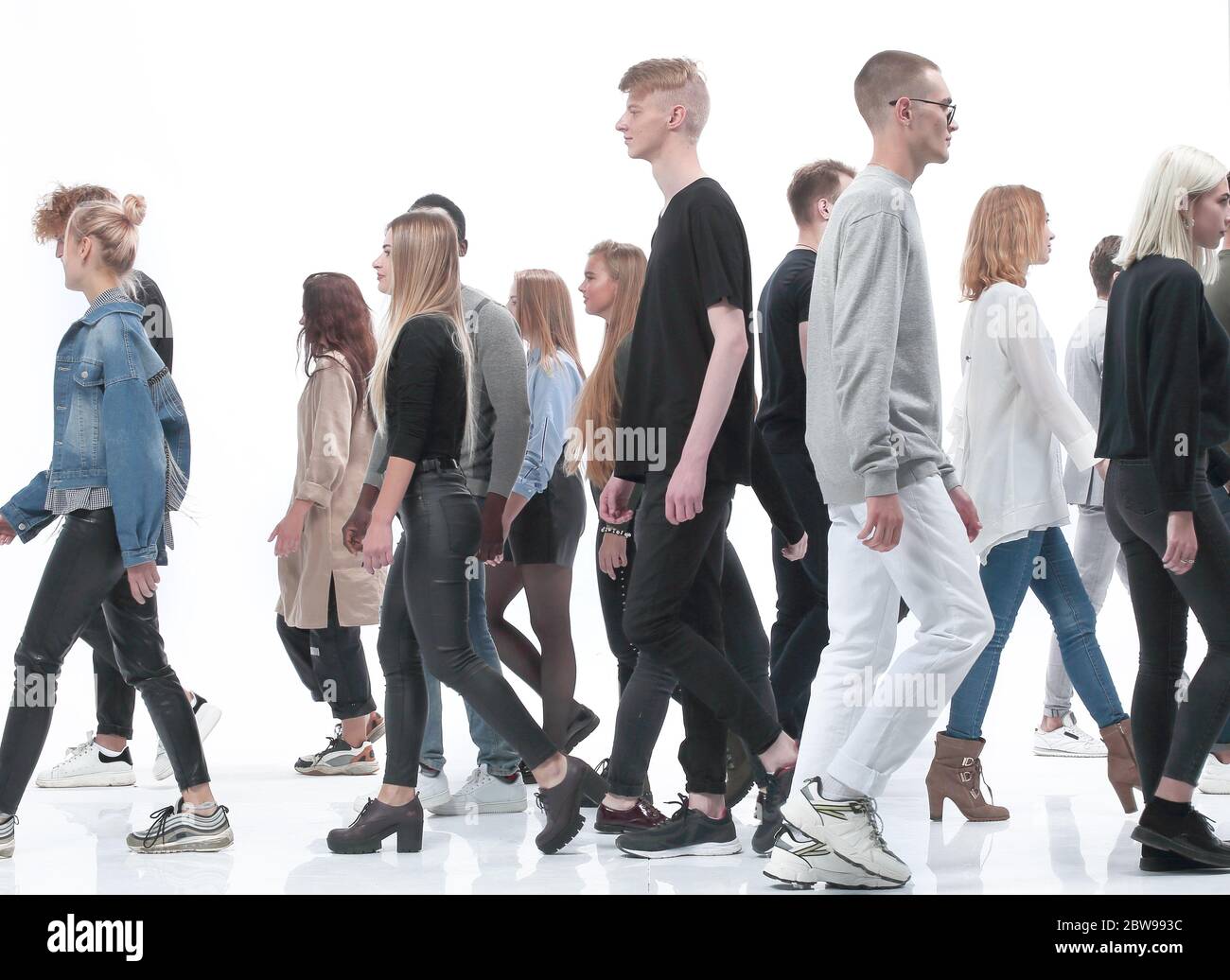 casual young people walking in different directions Stock Photo - Alamy