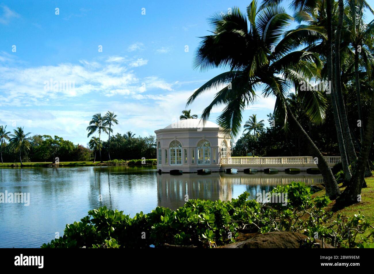 Beautiful wedding chapel is reflected in a lagoon on the Island of ...