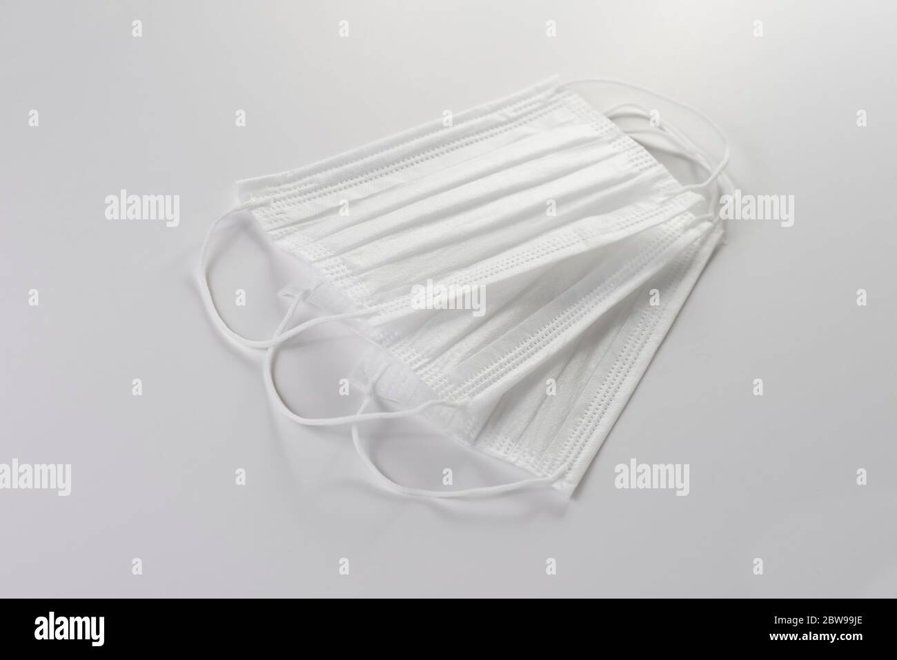 Three face masks on a white background Stock Photo - Alamy