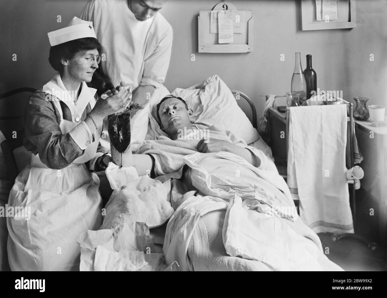 Nurse Dressing Wound of Injured American Soldier at Military Hospital I ...