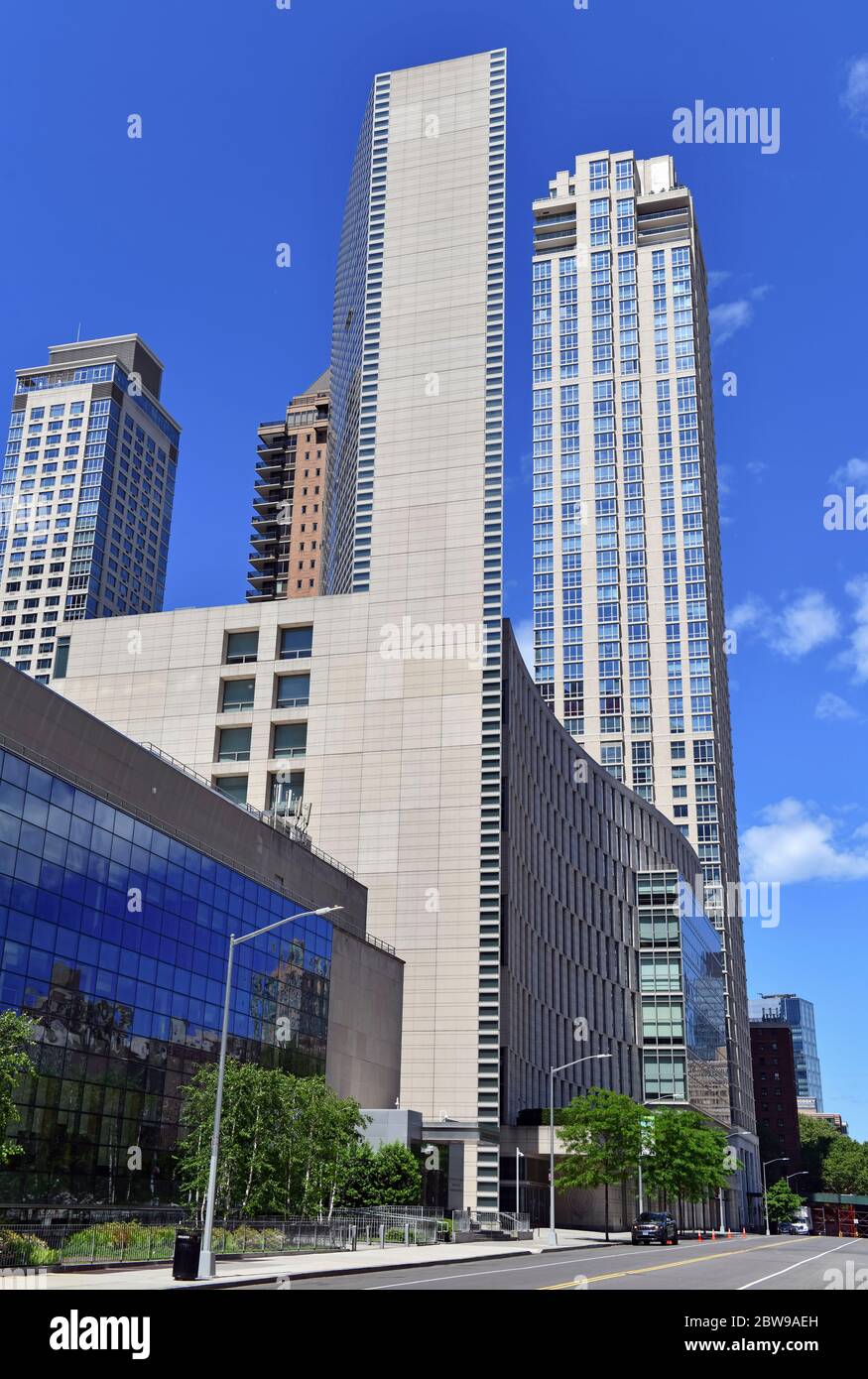 Tall high rise skyscraper with blue sky in Manhattan New York Stock ...