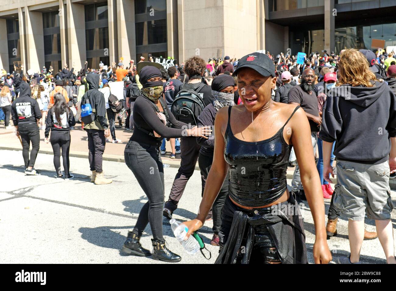Black woman tear gassed hi-res stock photography and images - Alamy