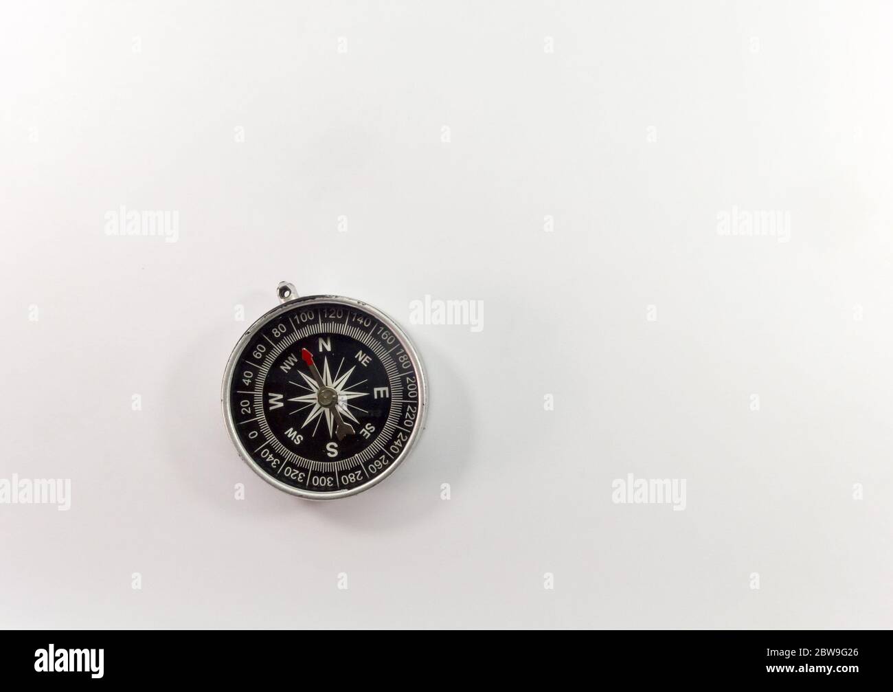 Black compass on a white background Stock Photo - Alamy
