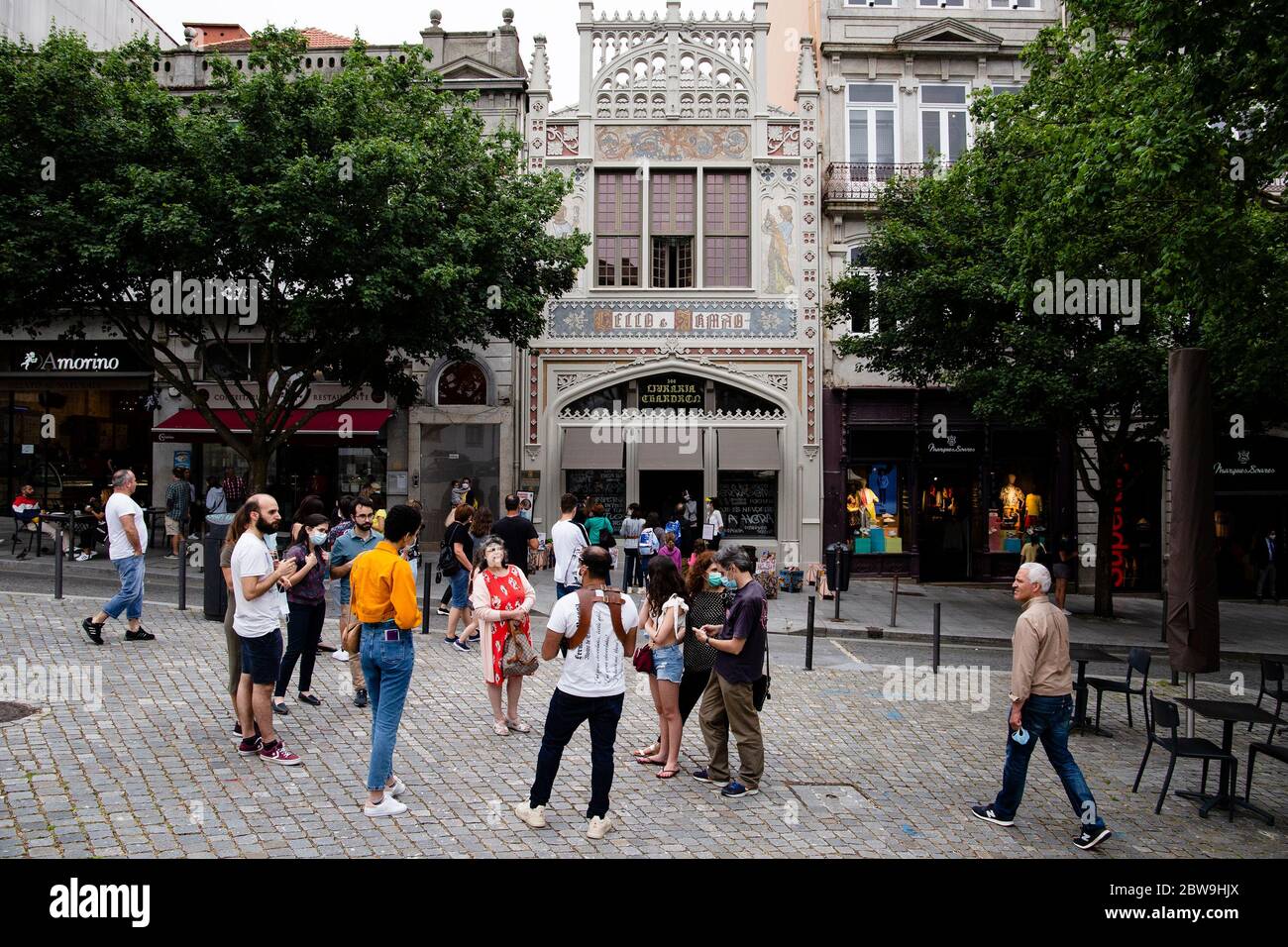 Porto, Portugal. 30th May, 2020. People are seen outside the lello ...