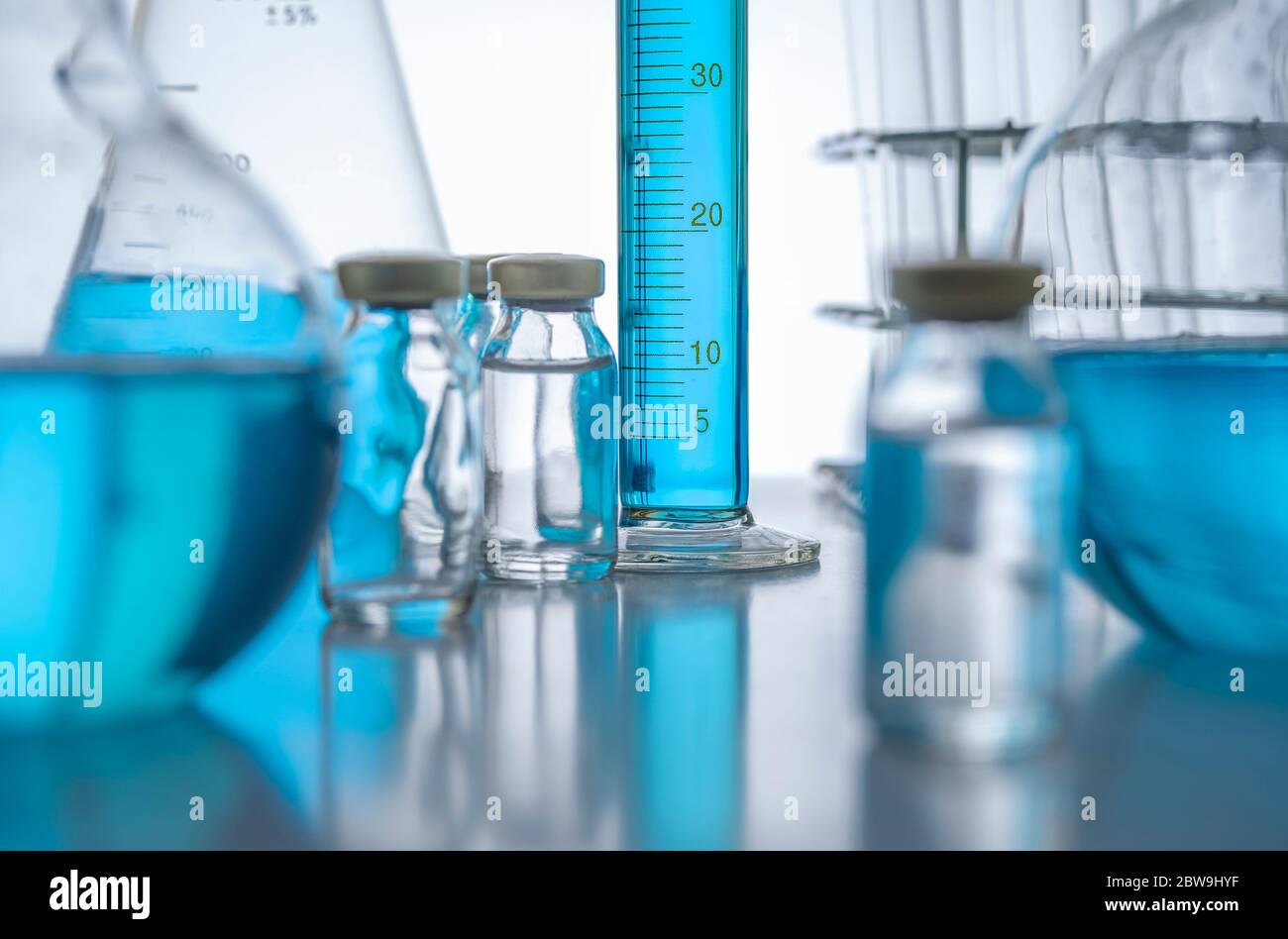 LaboratoryÂ glasswareÂ with blue liquid Stock Photo - Alamy