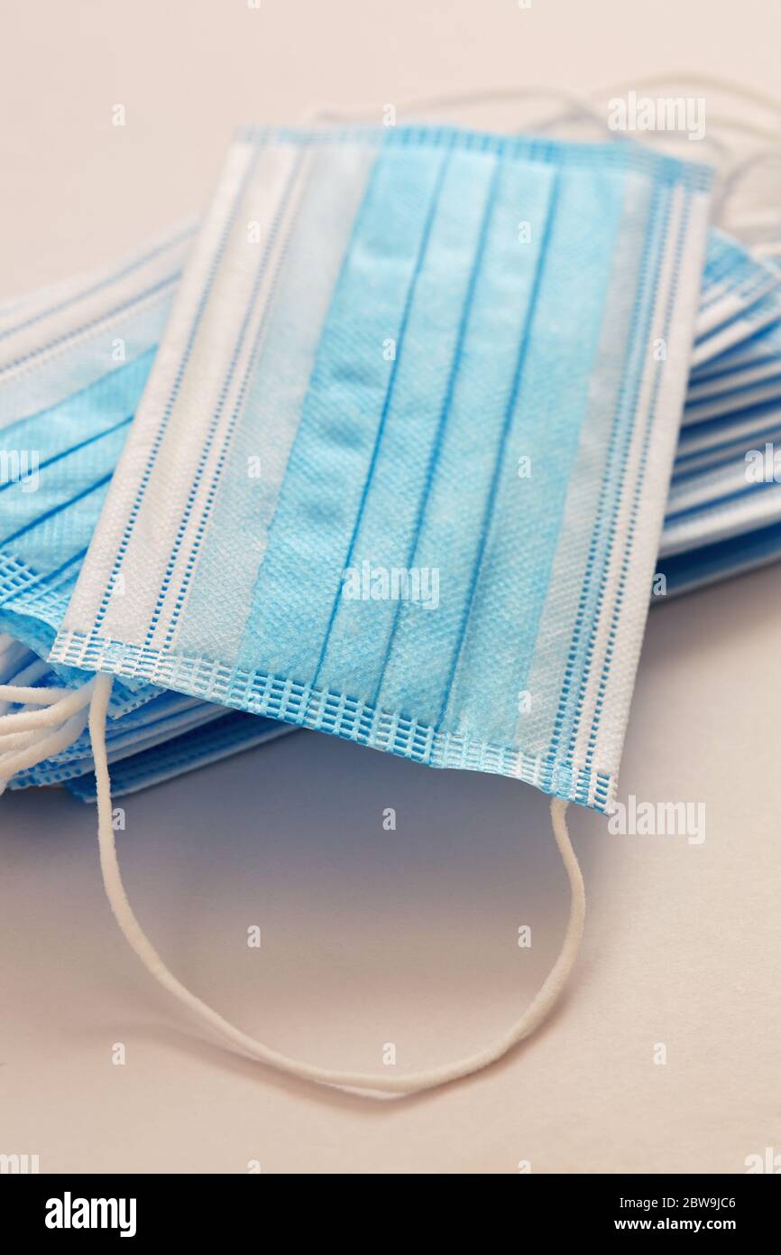 Studio shot of stack of surgical masks Stock Photo - Alamy
