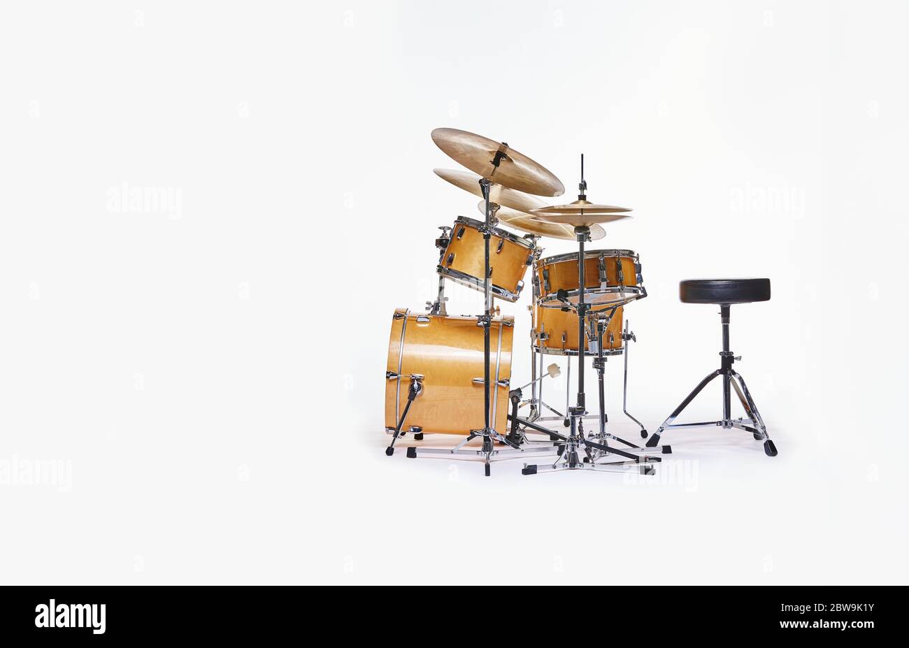 Drum set against white Stock Photo - Alamy