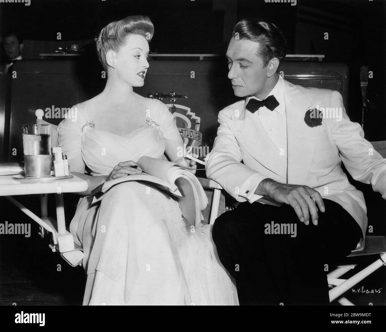 BETTE DAVIS and PAUL HENRIED on set candid during filming of NOW ...