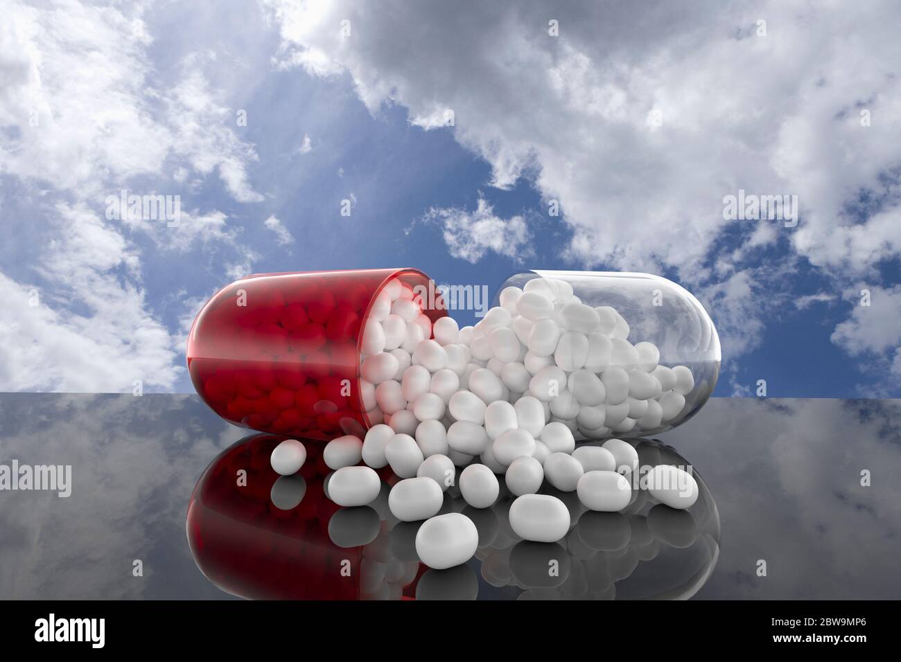 Capsule with white pills inside with clouds as background Stock Photo ...