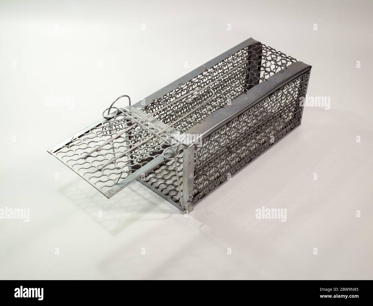 Cage mouse trap on white background Stock Photo - Alamy