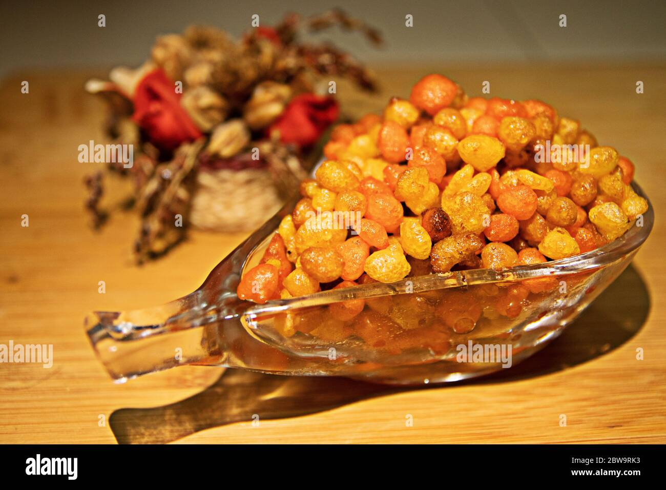 Bundia or Boondi is respectively Bangla and Hindi name of this snack ...