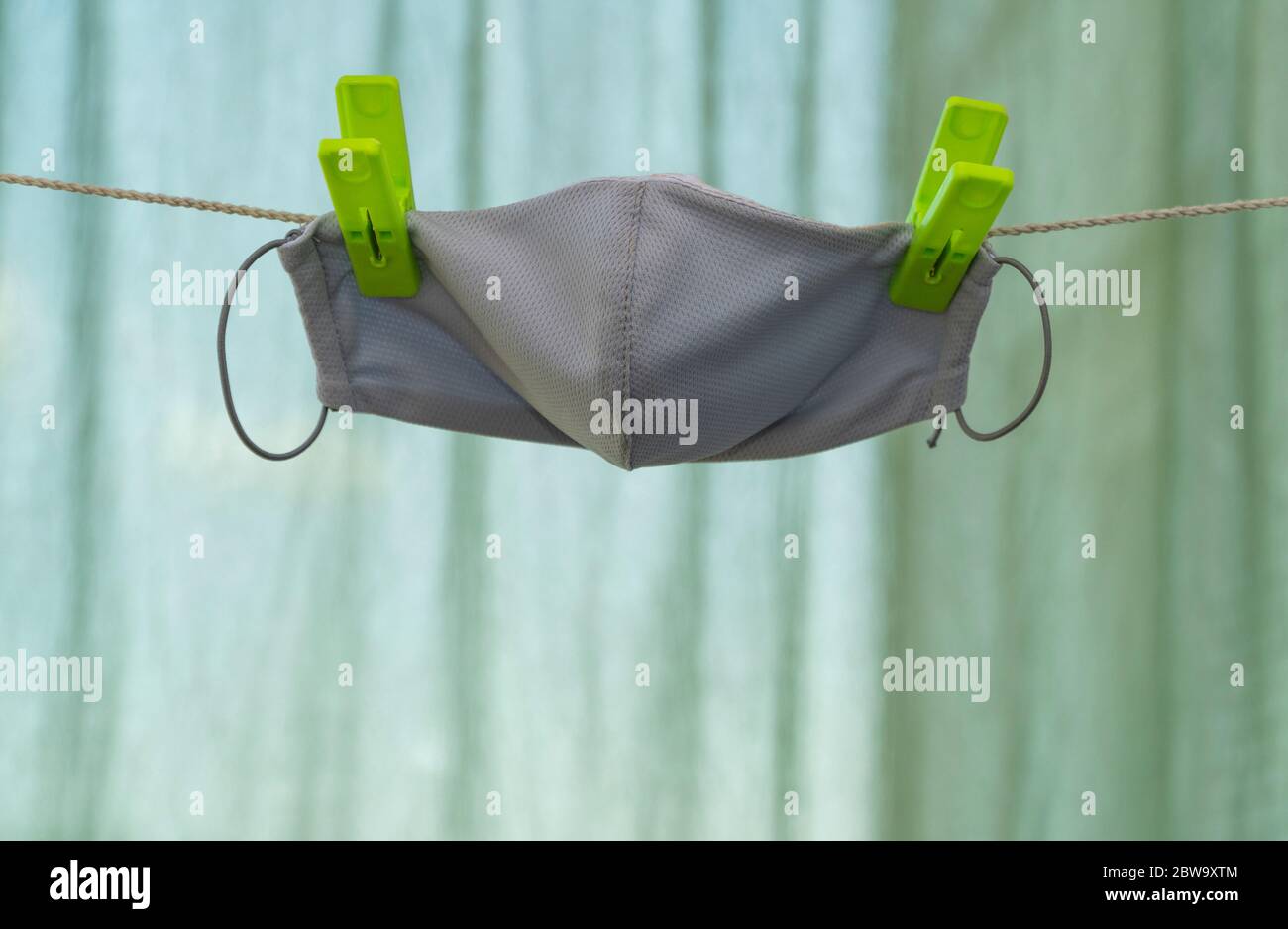 reusable medical mask after washing hanging on a clothesline Stock ...