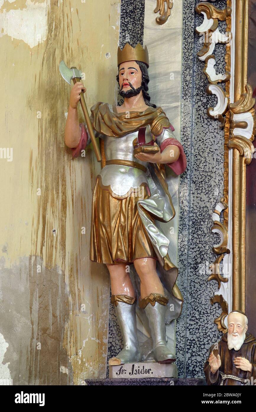 St. Isidore statue on the altar of the Holy Trinity at the Church of ...