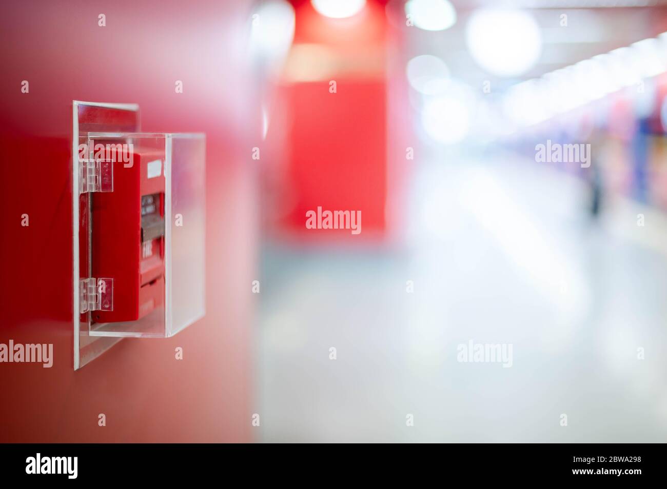 The red fire alarm switch on the red wall at the Bangkok subway Stock ...
