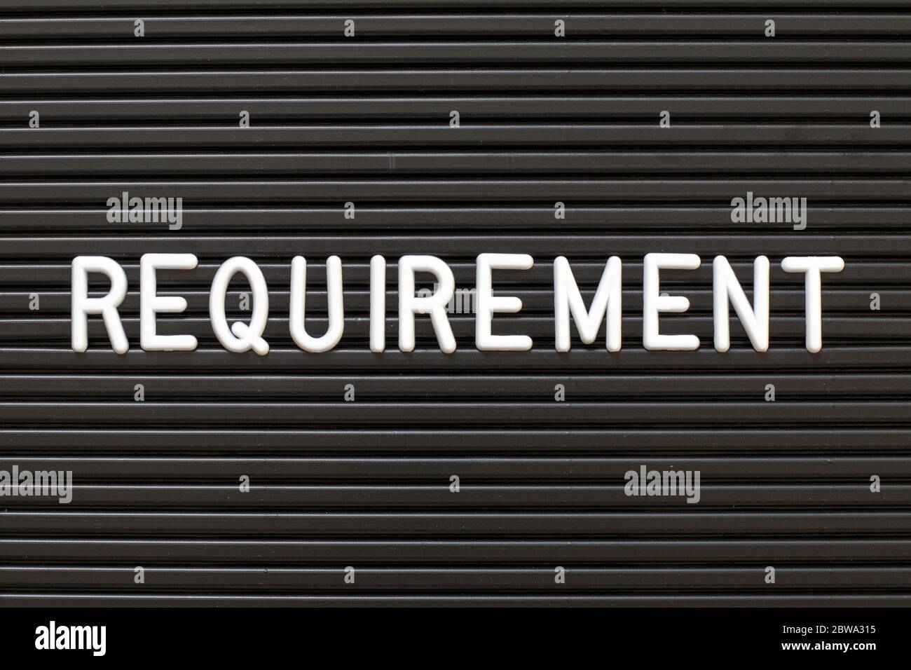 Black color felt letter board with white alphabet in word requirement ...