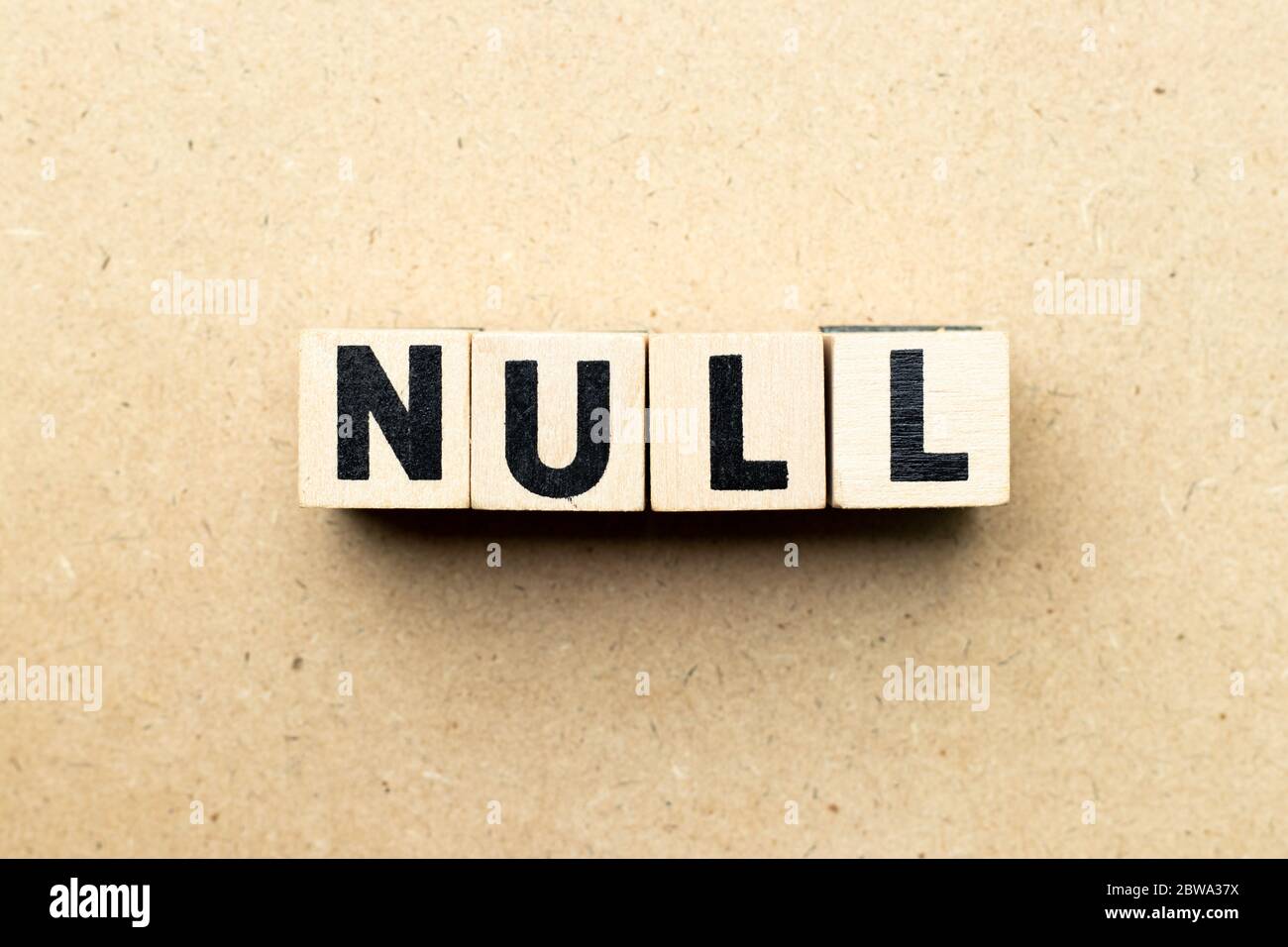 Letter block in word null on wood background Stock Photo - Alamy