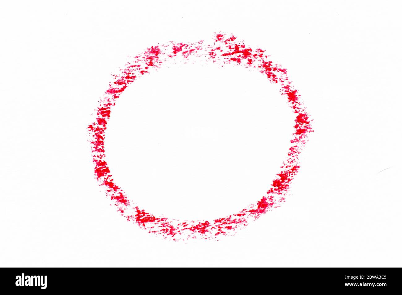 Red color oil pastel drawing in circle or round shape on white paper ...
