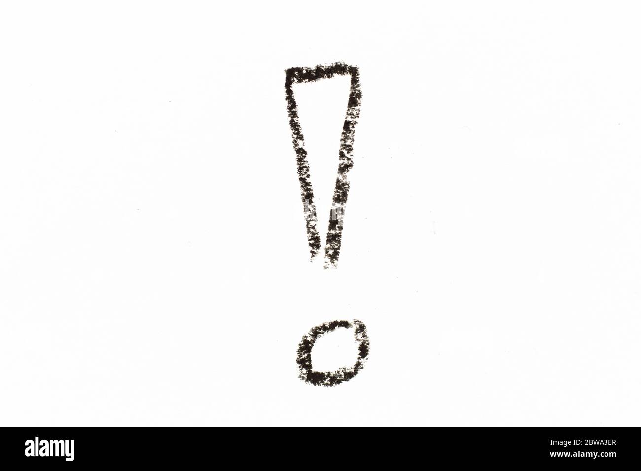 Black color oil pastel drawing in exclamation mark shape on white paper ...