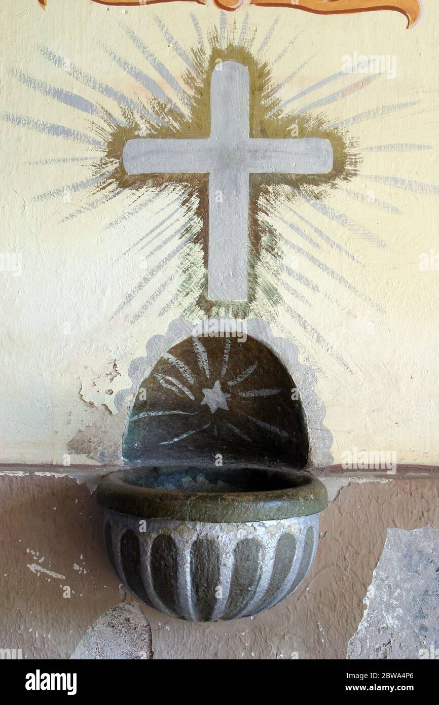 Holy water stoup in the Church of the Visitation of the Blessed Virgin ...