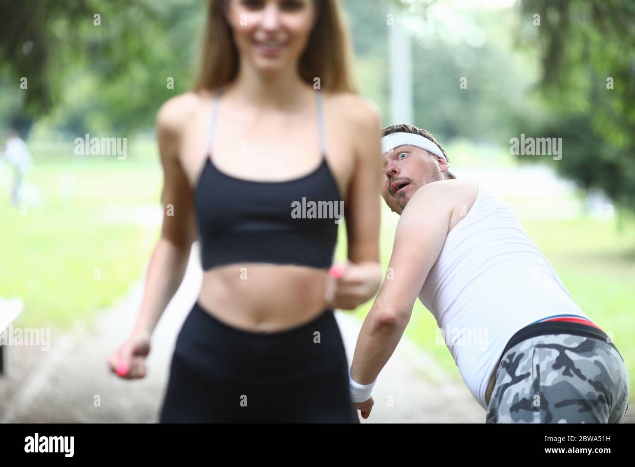 Running girl tracksuit hi-res stock photography and images - Alamy