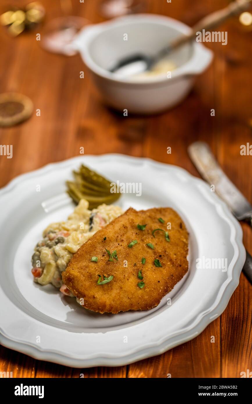 Czech chicken schnitzel or steak with potato salad. Czech traditional ...