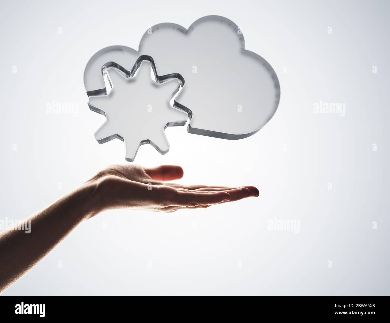 Cloud computing concept with glass symbol shown in hand Stock Photo - Alamy