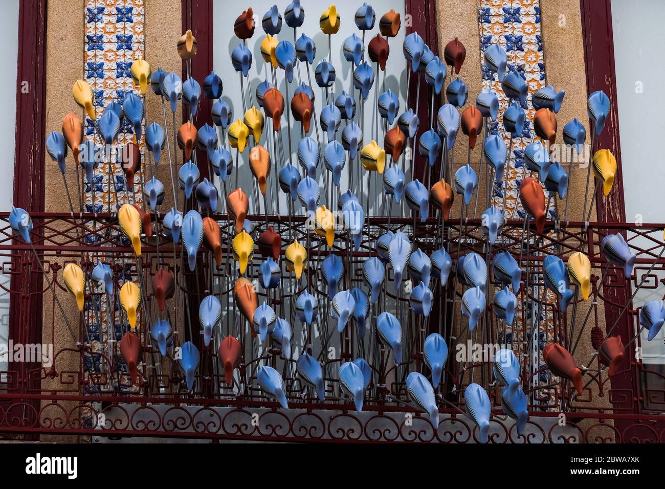 Group of Coloured Fish Objects Hanging in a Balcony of a Traditional ...