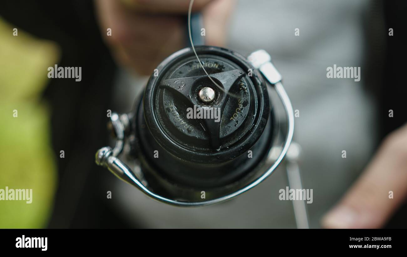 Fishing spool close-up fishing concept Stock Photo - Alamy